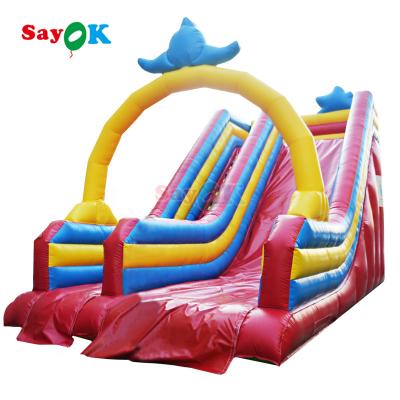 China Inflatable Pirate Slide Bouncy House 9x4.5x5.5m PVC Kids Dry Slide with LED Lights for sale