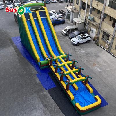 China Commercial Inflatable Water Double Slide with Palm Tree 20x5.1x7.9m for Kids and Adults for sale