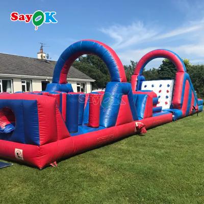 China SayOk Commercial Inflatable Obstacle Course 9.1x6x5.1m Giant PVC Bouncer for Adults with LED Lights for sale