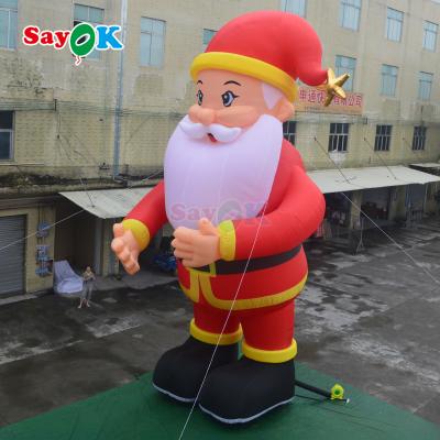 China 10m Giant Inflatable Santa Claus with LED Lights for Christmas Decoration for sale