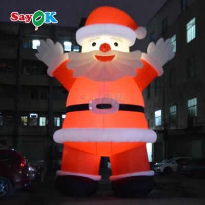 China 7m Giant Inflatable Santa Claus with LED Lights for Christmas Decoration for sale