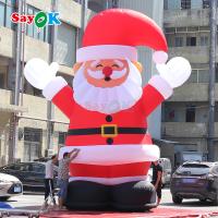China Giant Inflatable Santa Claus Outdoor Christmas Inflatables Decoration with LED Lights for sale