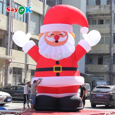 China Giant Inflatable Santa Claus Outdoor Christmas Inflatables Decoration with LED Lights for sale