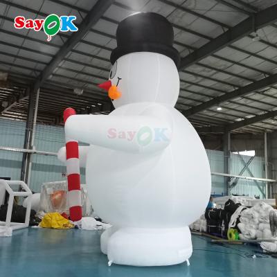 China 6m Inflatable Snowman with Candy Cane for Outdoor Christmas Decoration for sale