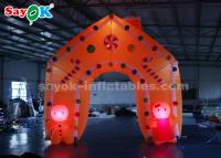 China Inflatable Christmas Arch Gingerbread Man Candy Sticks 4x4m with LED Lights for sale