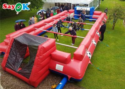 China Inflatable Human Foosball Court 8x5m PVC Red Customizable Indoor Outdoor Sports Game for sale
