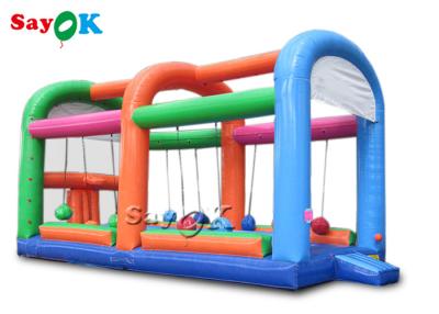 China Commercial Inflatable Gauntlet Interactive Sports Game with Wrecking Ball 0.55mm PVC for sale