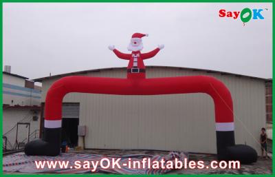 China Custom 600D Oxford Inflatable Christmas Arch with Santa Man for Outdoor Holiday Decoration for sale