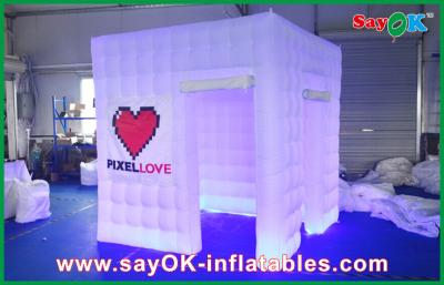 China Inflatable Photo Booth White Cube 2.4x2.4x2.5m with LED Light Two Doors for Events for sale