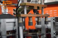 China 4 Cavity PET Blow Moulding Machine 6000BPH 2L Mineral Water Bottle Production Line for sale