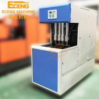 China 3000BPH Semi Auto PET Bottle Blowing Machine 4 Cavity 2L Water Bottle Blower for sale