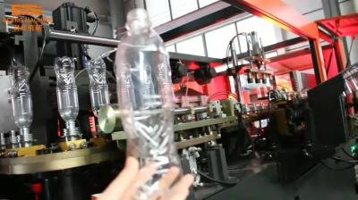 China SGS ISO PET Stretch Blowing Machine 4 Cavity 6000 BPH Plastic Bottle Manufacturing 3900kg for sale