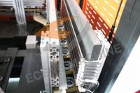 China 49kw PET Stretch Blowing Machine 4 Cavity 6000 BPH 2L Mineral Water Bottle Blower for sale