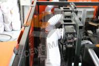China 49kw PET Stretch Blowing Machine 4 Cavity 6000 BPH 2L Mineral Water Bottle Blower for sale