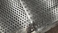 China Full CNC Punching Burr-Free Round Hole Staggered Perforated Mesh 0.5-3mm 1.22x2.44m for sale