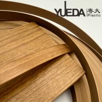 China Water Resistant Wood Grain PVC Edge Banding - Customizable Thickness & Length for Furniture Manufacturing for sale