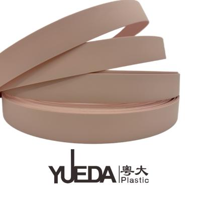 China Delicate Pink Plastic Edge Lipping Tape M9429 - Skin-Feel Texture for Cupboard Edges with PVC/ABS Construction for sale