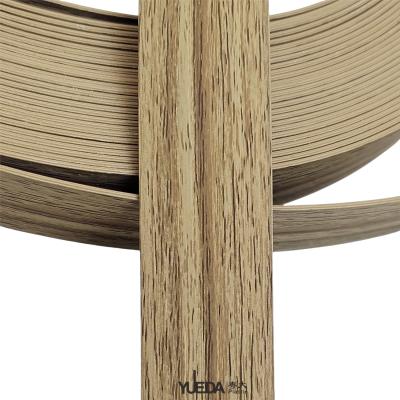 China M6082 Yellow Wood Grain PVC Lipping 22mm x 0.5mm Furniture Board Sealing Strip Flexible Durable for sale