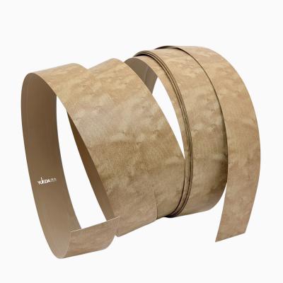 China Decorative Wood Grain PVC Edge Banding, Scratch‑Resistant Furniture Edge Trim for Cabinets Wardrobes for sale