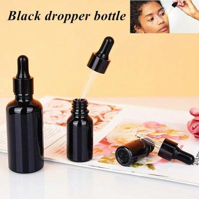 China Shiny Black Glass Dropper Bottles 10ml 20ml 30ml 50ml Empty Essential Oil Bottles with Pipette for sale
