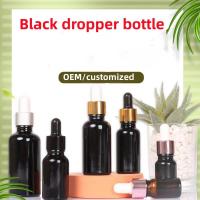 China Shiny Black Glass Dropper Bottles 10ml 20ml 30ml 50ml Empty Essential Oil Bottles with Pipette for sale