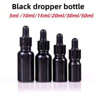 China Empty Black Glass Essential Oil Bottles 10ml 30ml 50ml with Dropper Boston Round for sale