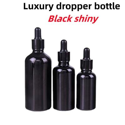 China Black Glass Dropper Bottle 10ml 20ml 30ml 50ml Essential Oil Packaging with Childproof Cap for sale