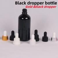 China 10ml 20ml 30ml 50ml Black Glass Dropper Bottle with Childproof Cap for Essential Oil Cosmetic Packaging for sale