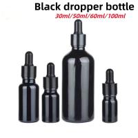 China 10ml 20ml 30ml 50ml Black Glass Dropper Bottle with Childproof Cap for Essential Oil Cosmetic Packaging for sale