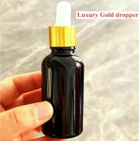 China Shiny Black Glass Dropper Bottle 10ml 30ml 50ml 100ml Essential Oil Cosmetic Packaging for sale