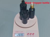 China Shiny Black Glass Dropper Bottle 10ml 30ml 50ml 100ml Essential Oil Cosmetic Packaging for sale