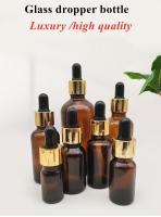 China Amber Glass Dropper Bottle 10ml 30ml 50ml for Essential Oil Serum Cosmetic Packaging for sale