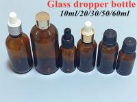 China Amber Glass Dropper Bottle 10ml 60ml Essential Oil Cosmetic Packaging with Black Dropper for sale