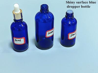 China 10ml 20ml 30ml 50ml Empty Boston Round Blue Essential Oil Glass Dropper Bottle with Dropper Cap for sale