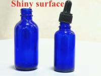 China 10ml 20ml 30ml 50ml Empty Boston Round Blue Essential Oil Glass Dropper Bottle with Dropper Cap for sale