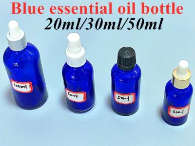 China Empty Round Glass Dropper Bottle 30ml 50ml Essential Oil Cosmetic Packaging Blue Clear for sale