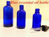China Empty Round Glass Dropper Bottle 30ml 50ml Essential Oil Cosmetic Packaging Blue Clear for sale