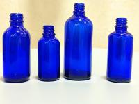 China Empty Round Glass Dropper Bottle 30ml 50ml Essential Oil Cosmetic Packaging Blue Clear for sale