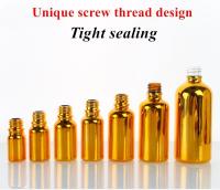 China Luxury Gold UV Electroplate Glass Dropper Bottle 30ml 50ml for Essential Oil Serum with Spray Head for sale