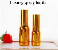 China 30ml 50ml Essential Oil Glass Dropper Bottle with Electroplating Gold Spray Head for sale