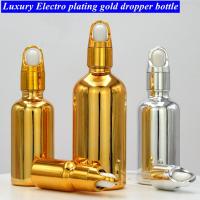 China 10ml 50ml Electroplate Gold Glass Dropper Bottles for Essential Oil Cosmetic Packaging for sale