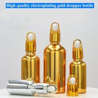 China UV Gold Coated Glass Dropper Bottle 10ml 20ml 30ml 50ml for Essential Oil Serum for sale