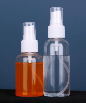 China 60ml 100ml Round PET Plastic Spray Bottle for Cosmetic Hand Sanitizer 50ml Clear for sale