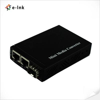 China Mini 2x 10/100/1000Base-T RJ45 to 1x 1000Base-X SFP Slot Gigabit Ethernet Media Converter for sale