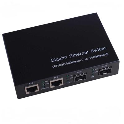 China 10/100/1000M Media Converter 4-TX + 2-FX(SC) Port Fiber Switch for sale