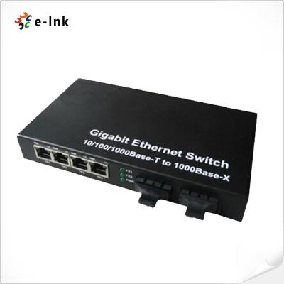 China 10/100/1000M Media Converter 4-TX + 2-FX(SC) Port Fiber Switch for sale