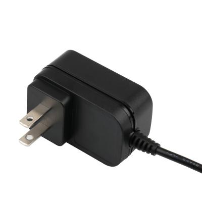 China 1310 UL Certified 0.65A 9.0V AC Switching Power Supply Efficiency VI With US Plug for sale