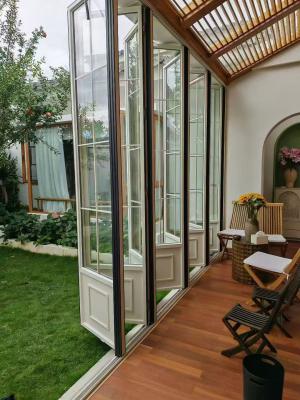 China Custom Cream White French Aluminum Bi-Fold Door For Garden And Patio for sale