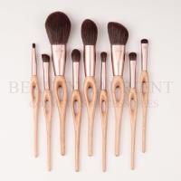 China Patented 9pcs Complete Face Brush Set Walnut Wooden Handle Facial Brush Kit for sale