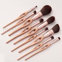 China Patented 9pcs Complete Face Brush Set Walnut Wooden Handle Facial Brush Kit for sale